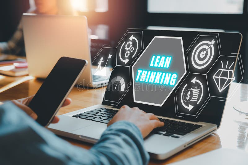 Person Using Computer in Cafe with Lean Thinking Icon on Virtual Screen ...