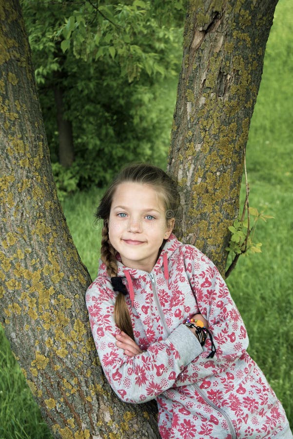 Lean on tree stem stock photo. Image of stem, positive - 88811374