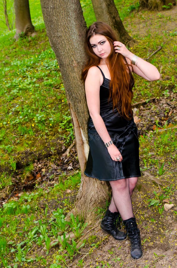 She is Leaning Back Against the Tree Stock Image - Image of adult ...