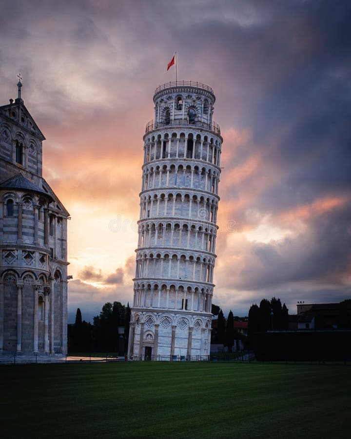 Leaning Tower of Pisa at Sunset with Dramatic Clouds in the Background ...
