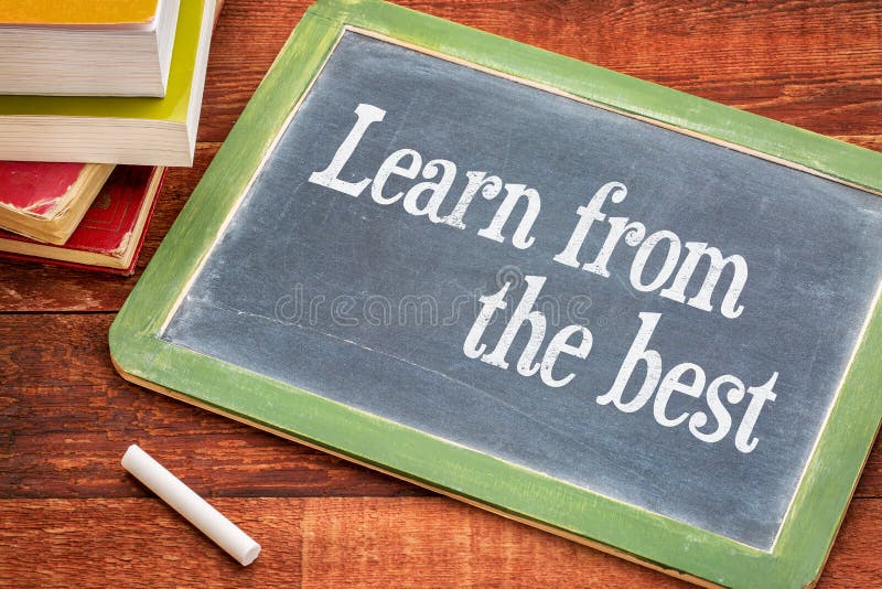 The Best Way To Learn. a Young Boy Writing on the Blackboard at School ...
