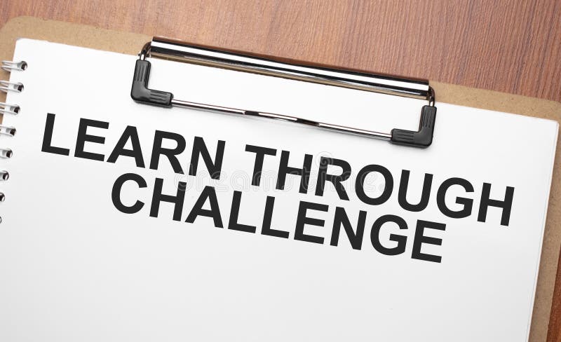 Learn through Challenge Text on White Paper on the Wood Table Stock ...