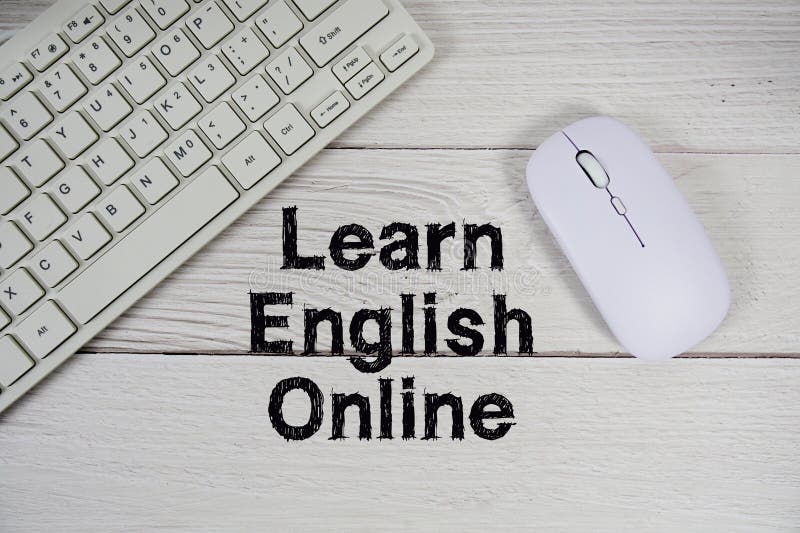 Learn English Online Text with Keyboard and Optical Mouse on Wooden ...