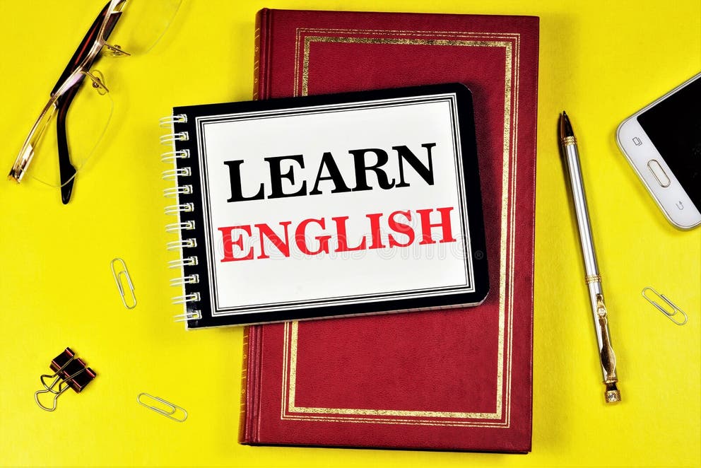 Learn English.- Writing Text in a Notebook on a Textbook Stock Image ...