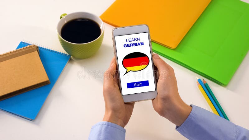 Learn German Application on Cellphone in Persons Hands, Studying ...