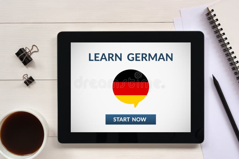 Learn German Concept on Tablet Screen with Office Objects Stock Photo ...