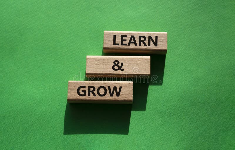 Learn and Grow Symbol. Concept Words Learn and Grow on Wooden Blocks ... Learn and Grow Symbol. Concept Words Learn and Grow on Wooden Blocks ...