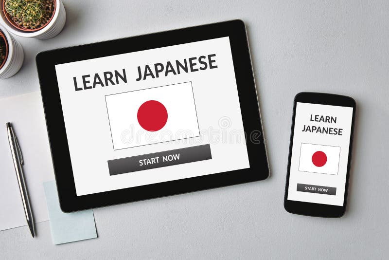 Learn Japanese Concept on Tablet Screen with Office Objects Stock Photo ...