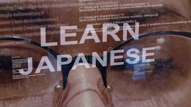 Learn Japanese Text on Background of Female Developer Stock Footage ...