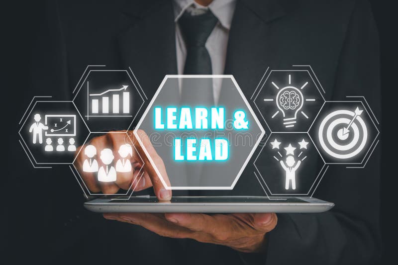 Person Using Tablet Computer with Learn and Lead Icon on Vitual Screen ...