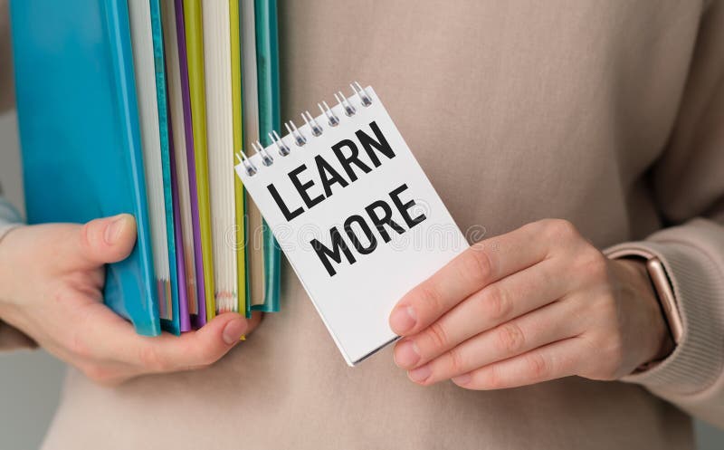 Learn More Text on Notebook in Hands with Books, Concept of Education.p ...