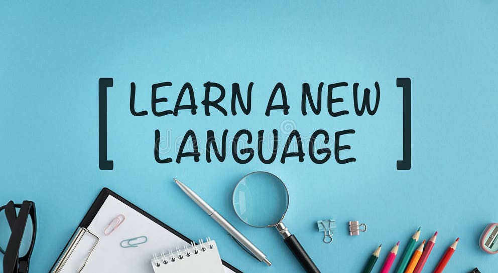 Learn a New Language Text Written on Blue Paper with Pencils in Office ...