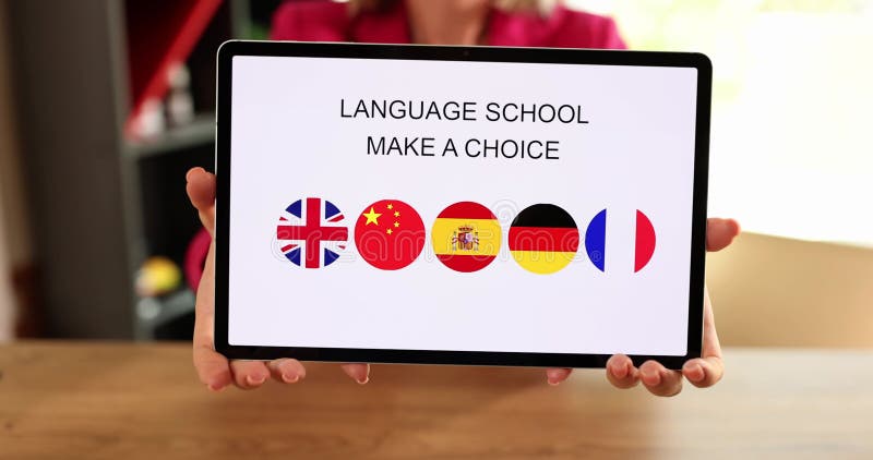 Learn New Language and Words in Different Languages on Tablet Computer Screen and Flags of ...