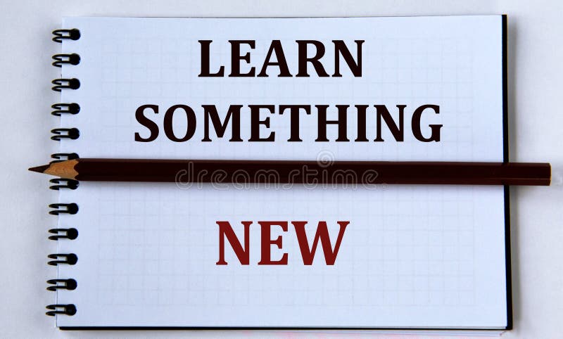 LEARN SOMETHING NEW - Words in White Notebook on White Background with ...