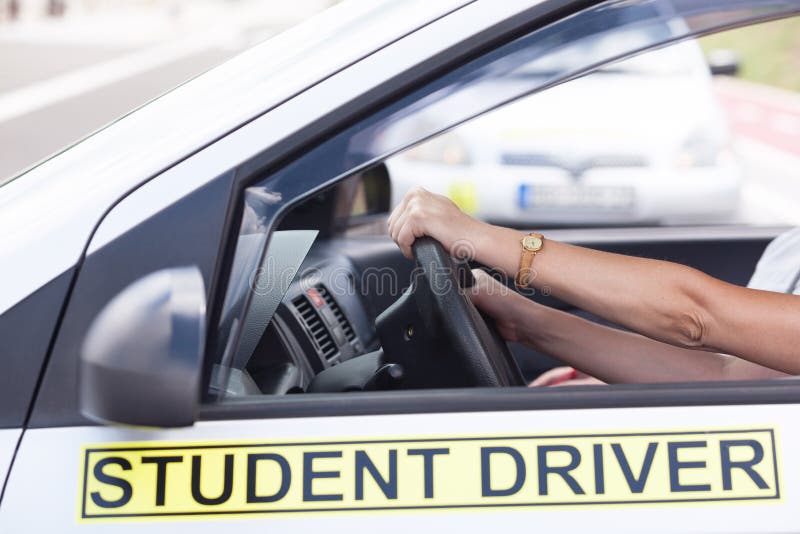 Learner Driver Holding Steering Wheel during Driving Lesson Stock Photo ...
