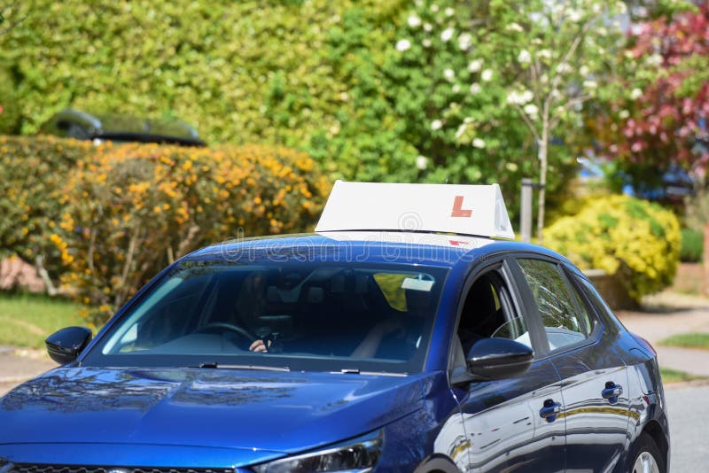 Learner Driving Having Driving Lesson To Learn To Drive on Public Roads ...