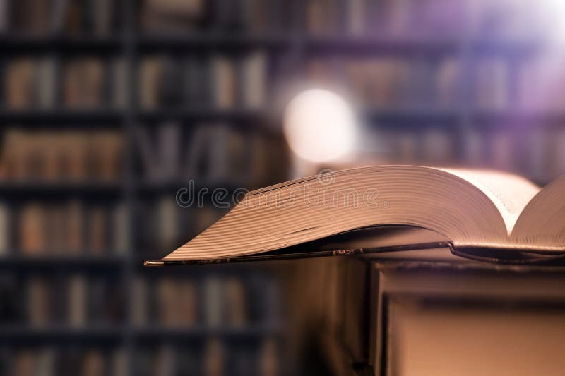 Learning from Books in the Library. Open Book in College Library ...