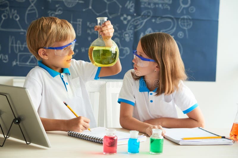 Learning Chemistry Together Stock Photo - Image of education, reagent ...
