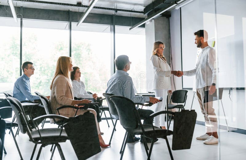 In the Learning Class. Group of Professional Business People is in the ...