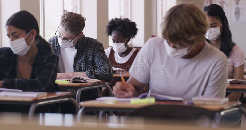Education, Exam and a Boy Student Writing in Class during a Test or ...