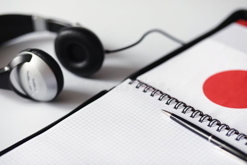 Learning Foreign Languages. Notepad for Entries and a Flag Stock Photo ...