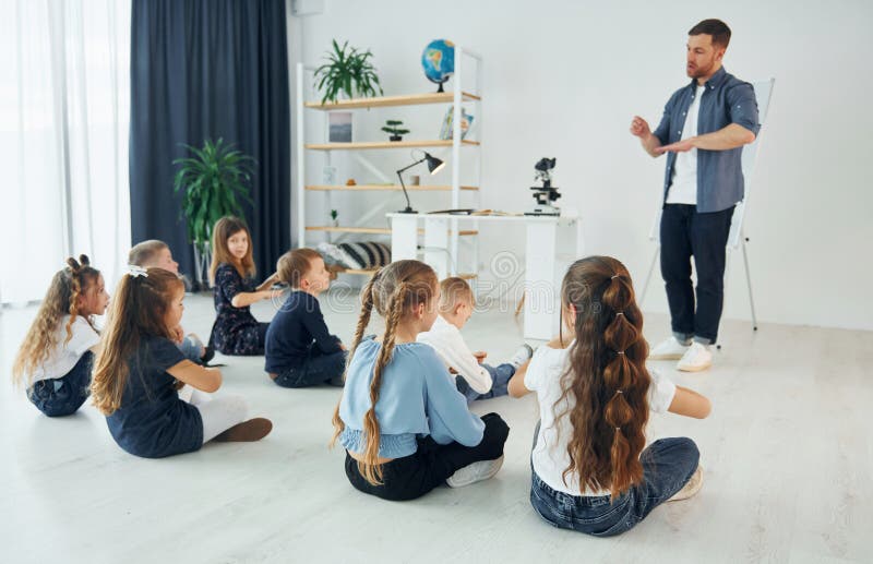 Learning Gesture Language. Group of Children Students in Class at ...