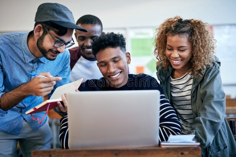 Learning Great Things Together. University Students Sitting in Class ...