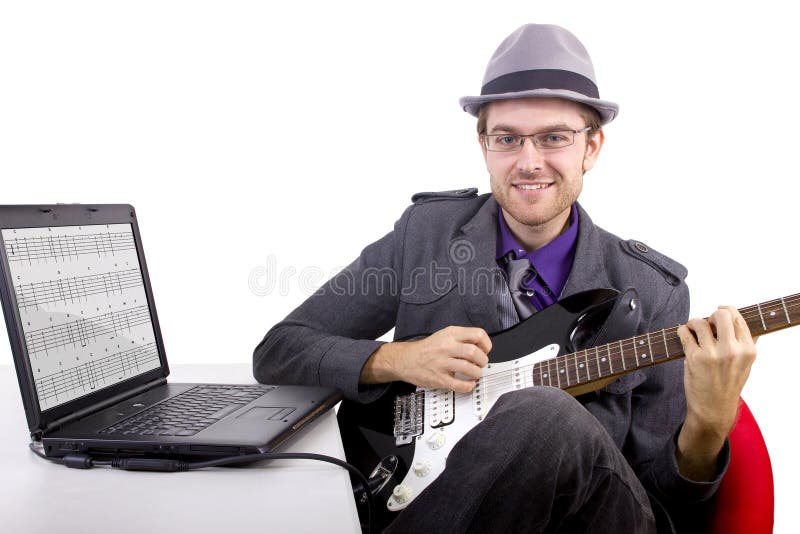 Learning Guitar Online stock image. Image of musician - 31022837