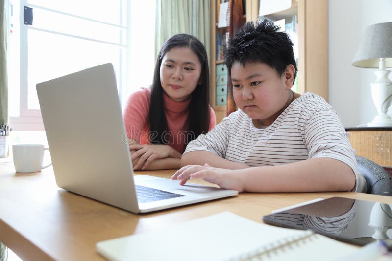 Learning at Home stock image. Image of online, table - 254496027