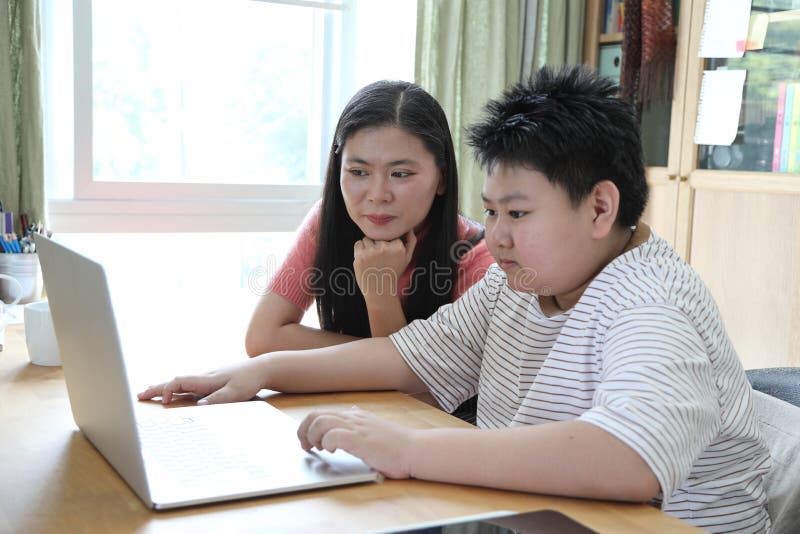 Learning at Home stock image. Image of indoor, teaching - 254496161