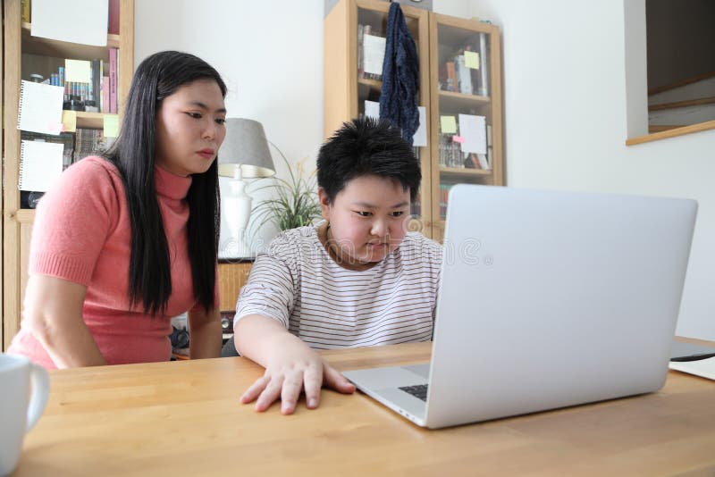 Learning at Home stock image. Image of support, mother - 254496181