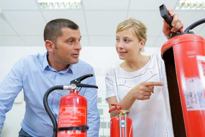Learning How To Operate Fire Extinguisher Stock Image - Image of ...