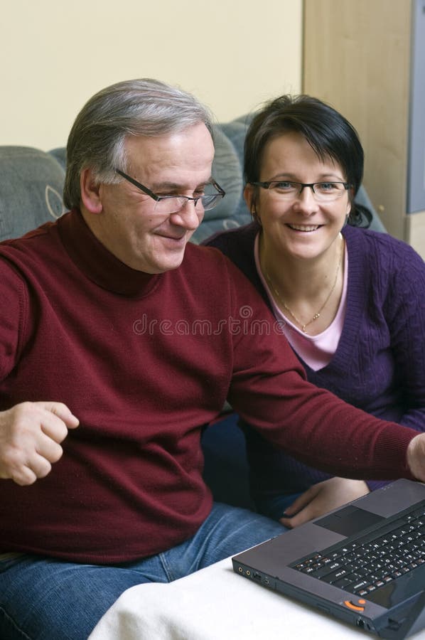 Learning how to use laptop stock photo. Image of adults - 8354736