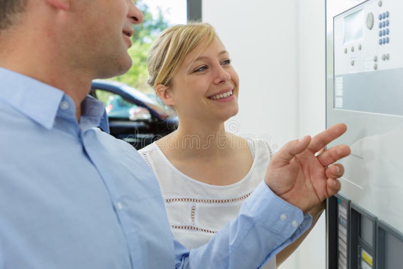 Learning How To Use Machine Stock Photo - Image of presenting, hand ...