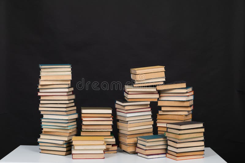 Learning Library Science Stack of Books on a Black Background Stock ...