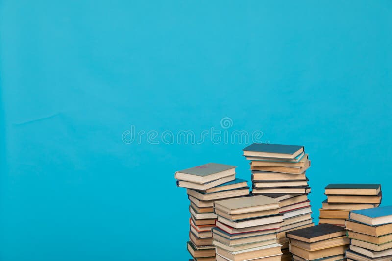 Learning Library Science Stack of Books on a Blue Background Stock ...