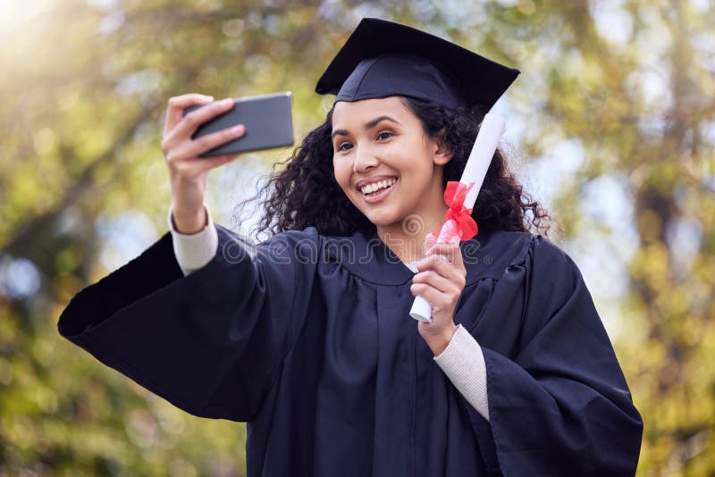 Learning Looks Good on You. Shot of a Young Woman Taking a Selfie on ... Learning Looks Good on You. Shot of a Young Woman Taking a Selfie on ...