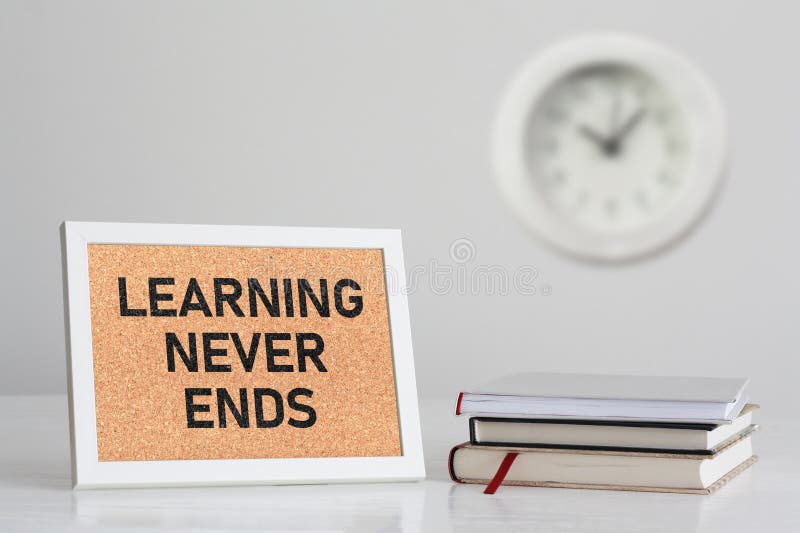 Learning Never Ends is Shown Using the Text and Photo of the Books and Clock Stock Image - Image ...