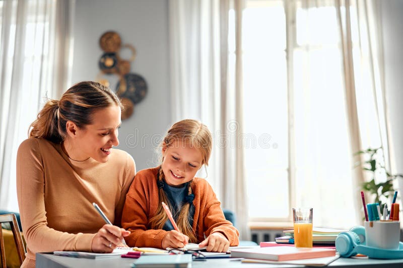 Learning New Together. Easygoing Lady Looking at Kid Sitting at Corner ...