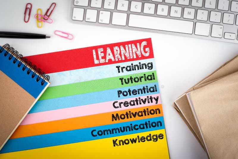Learning. Office Desk with a Computer Keyboard and Color Pages Stock ...