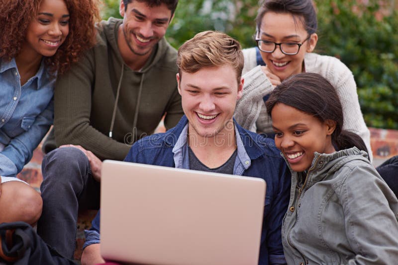 Learning is Requited. a Group of Students Sitting Outside while on ...