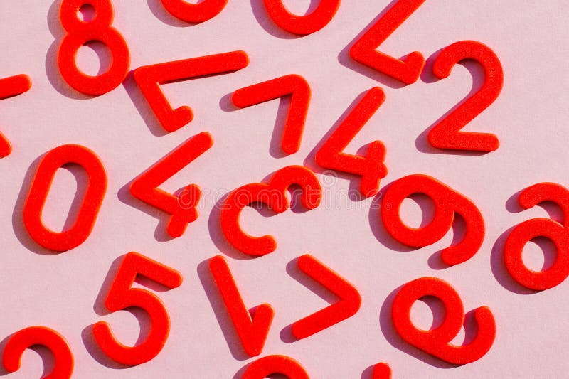 Learning To Count. a Set of Red Numbers on the Table Stock Image ...