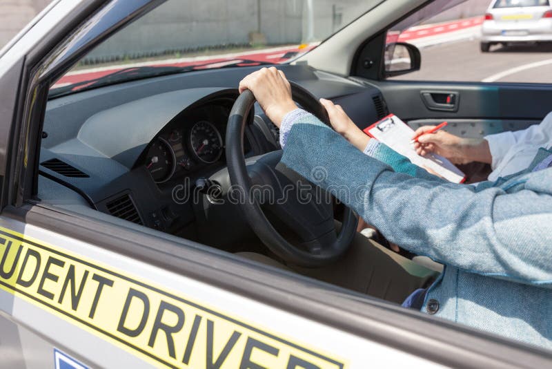 Learning To Drive a Car with a Driving Instructor. Student Drive Stock ...