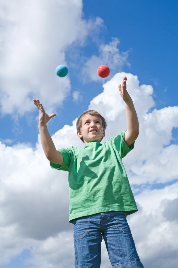 Learning to juggle stock image. Image of portrait, motion - 5939879
