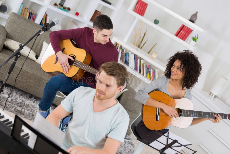 Learning To Play Different Instruments at Home Stock Image - Image of ...