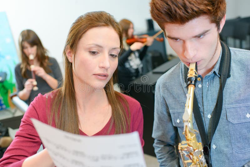 Learning to play saxophone stock image. Image of jazz - 89030811