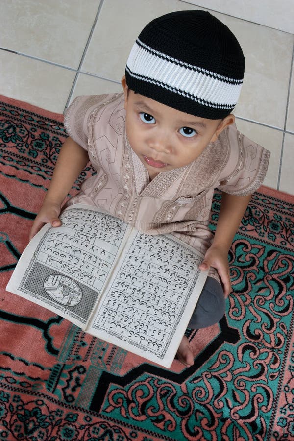 Learning to read Quran stock photo. Image of religion - 13562824