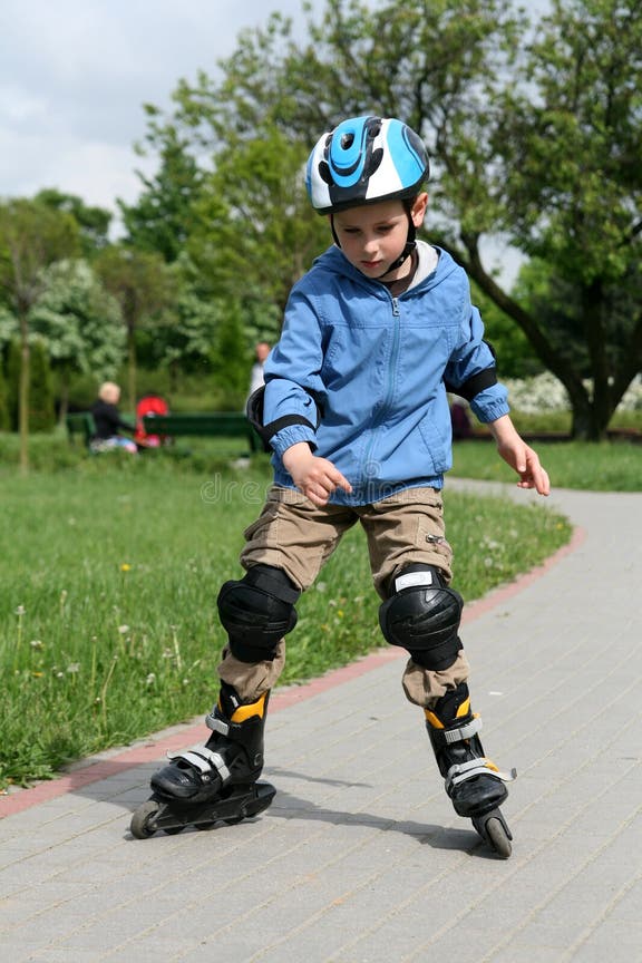 Learning To Ride on Rollerblades Stock Image - Image of person, happy ...