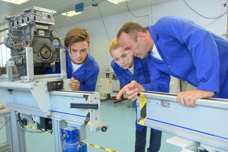 Learning to use machine stock photo. Image of engineer - 84633222