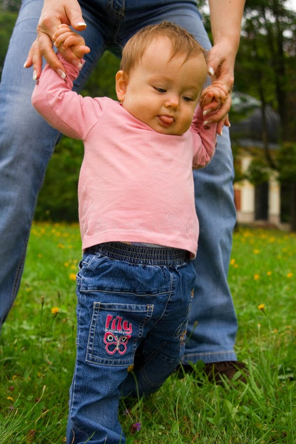 Learning to walk stock photo. Image of daughter, expression - 6206992